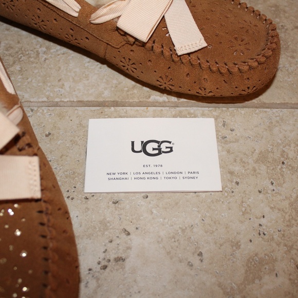 UGG | Shoes | Ugg Dakota Perf Bow Suede Slippers | Poshmark
